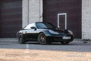 Porsche 911 1999 in Tallinn on AUTOMOTO.COM.LV Black Porsche 911 1999 in Tallinn, with an engine capacity of 3.40 L and mileage of 262 thousand km for 28500 €, photo 1 on AUTOMOTO.COM.LV