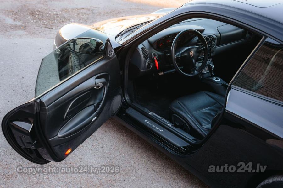 Melns Porsche 911 1999 Tallina, ar dzinēja tilpumu 3.40 L un nobraukumu 262 tūkst. km par 28500 €, foto 10 vietnē AUTOMOTO.COM.LV