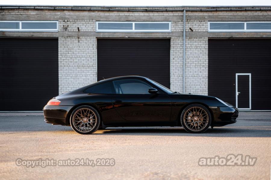 Melns Porsche 911 1999 Tallina, ar dzinēja tilpumu 3.40 L un nobraukumu 262 tūkst. km par 28500 €, foto 13 vietnē AUTOMOTO.COM.LV