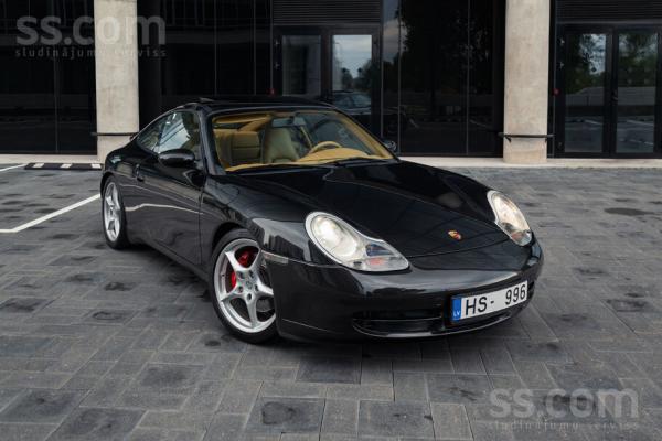 Black Porsche 911 2000 in Riga, with an engine capacity of 3.40 L and mileage of 90 thousand km for 36999 €, photo 1 on AUTOMOTO.COM.LV