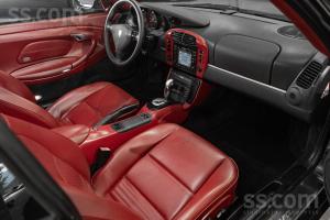 Melns Porsche 911 2000 Rīga, ar dzinēja tilpumu 3.40 L un nobraukumu 180 tūkst. km par 27000 €, foto 11 vietnē AUTOMOTO.COM.LV