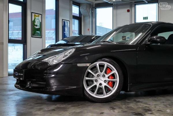 Melns Porsche 911 2004 Marijampole, ar dzinēja tilpumu 3.60 L un nobraukumu 81 tūkst. km par 77750 €, foto 6 vietnē AUTOMOTO.COM.LV