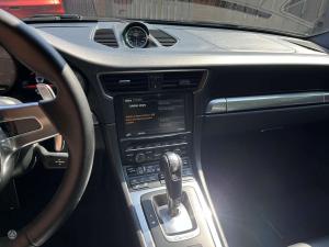Black Porsche 911 2013 in Alytus, with an engine capacity of 3.80 L and mileage of 59 thousand km for 59290 €, photo 16 on AUTOMOTO.COM.LV