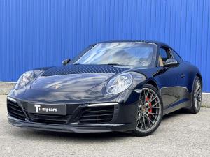 Black Porsche 911 2017 in Kaunas, with an engine capacity of 2.98 L and mileage of 87 thousand km for 84911 €, photo 1 on AUTOMOTO.COM.LV
