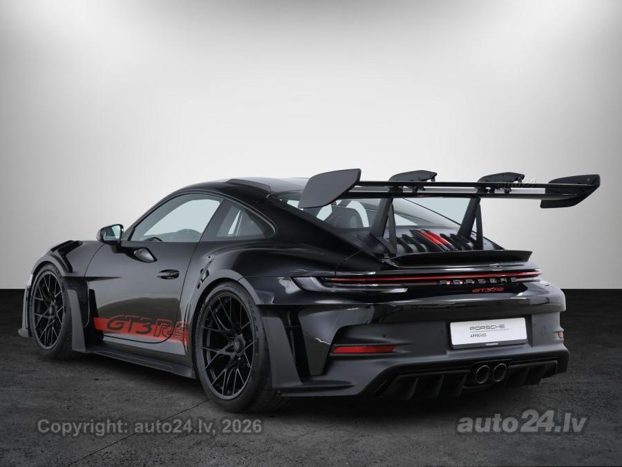 Black Porsche 911 2023 in Tallinn, with an engine capacity of 4.00 L and mileage of 7 thousand km for 290000 €, photo 5 on AUTOMOTO.COM.LV