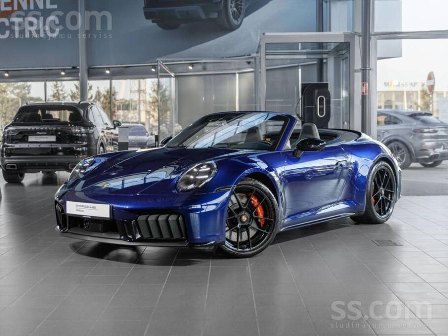 Blue Porsche 911 2026 in Riga, with an engine capacity of 3.60 L and mileage of 8 thousand km for 189900 €, photo 1 on AUTOMOTO.COM.LV
