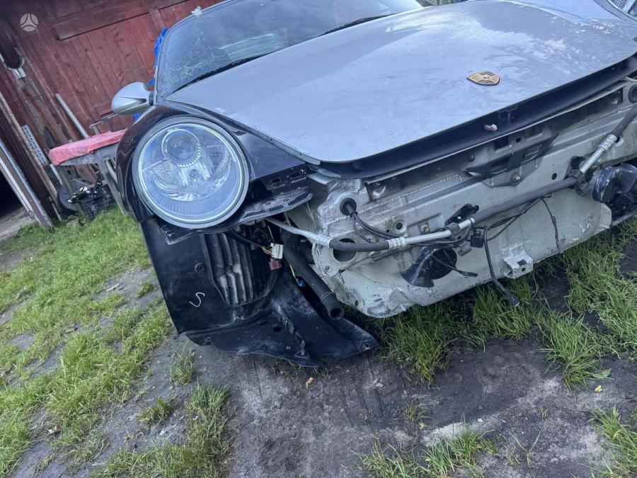 Pelēks Porsche 911 2009 Alīta, ar dzinēja tilpumu 3.80 L un nobraukumu 44 tūkst. km par 25000 €, foto 11 vietnē AUTOMOTO.COM.LV