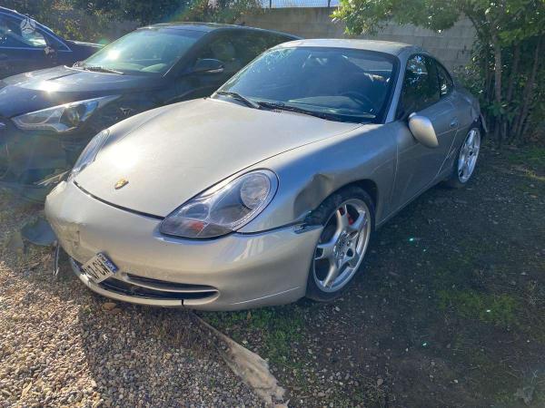 Pelēks Porsche 911 1997 Tauragė, ar dzinēja tilpumu 3.39 L un nobraukumu 130 tūkst. km par 8500 €, foto 1 vietnē AUTOMOTO.COM.LV