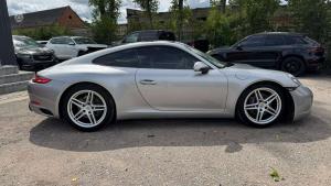 Grey Porsche 911 2019 in Ukmerge, with an engine capacity of 3.00 L and mileage of 28 thousand km for 57990 €, photo 3 on AUTOMOTO.COM.LV