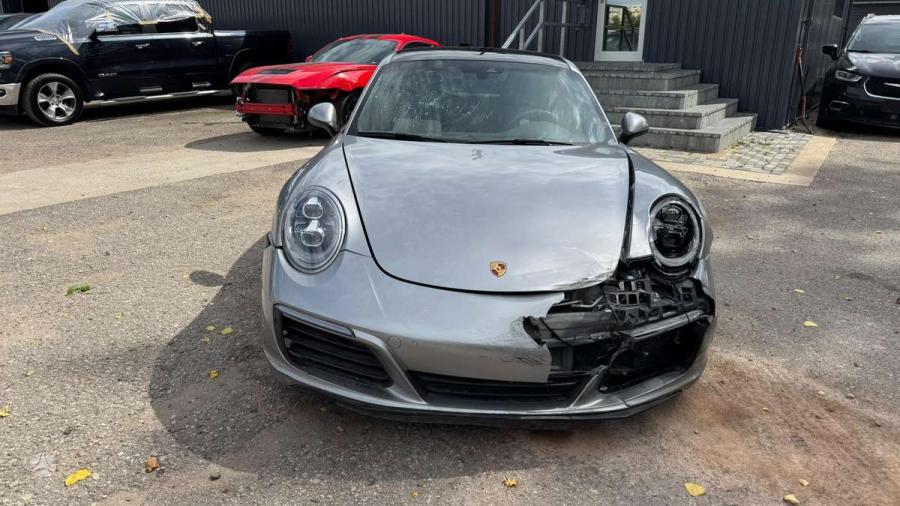 Grey Porsche 911 2019 in Ukmerge, with an engine capacity of 3.00 L and mileage of 28 thousand km for 57990 €, photo 4 on AUTOMOTO.COM.LV
