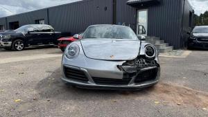 Grey Porsche 911 2019 in Ukmerge, with an engine capacity of 3.00 L and mileage of 28 thousand km for 57990 €, photo 6 on AUTOMOTO.COM.LV