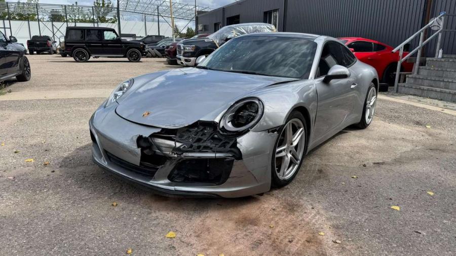 Grey Porsche 911 2019 in Ukmerge, with an engine capacity of 3.00 L and mileage of 28 thousand km for 57990 €, photo 8 on AUTOMOTO.COM.LV