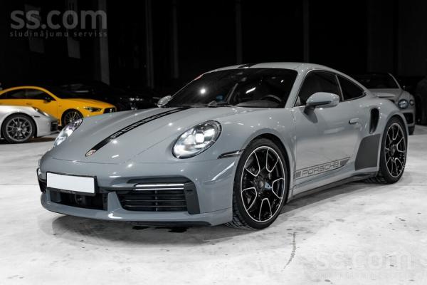 Grey Porsche 911 2023 in Riga, with an engine capacity of 3.80 L and mileage of 28 thousand km for 208725 €, photo 1 on AUTOMOTO.COM.LV