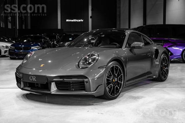 Grey Porsche 911 2023 in Riga, with an engine capacity of 3.80 L and mileage of 6 thousand km for 248050 €, photo 1 on AUTOMOTO.COM.LV