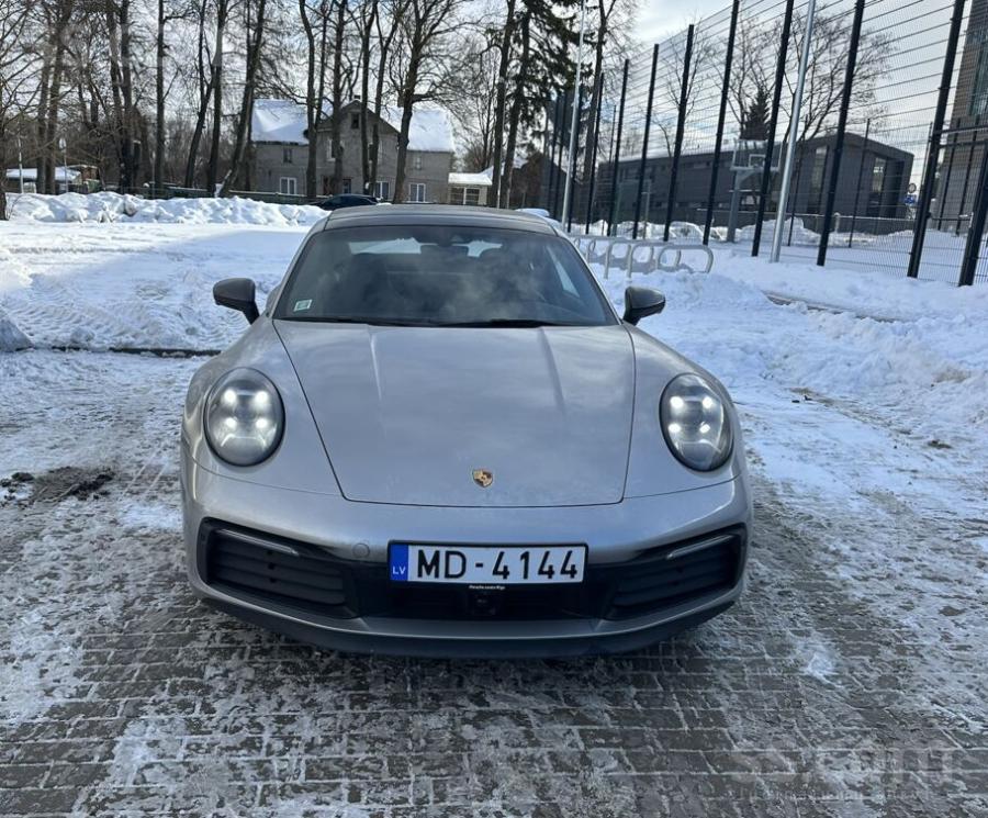 Grey Porsche 911 2024 in Riga, with an engine capacity of 3.00 L and mileage of 15 thousand km for 119000 €, photo 2 on AUTOMOTO.COM.LV