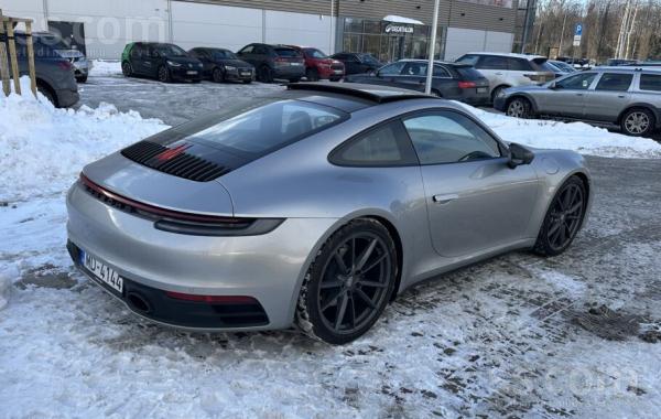Grey Porsche 911 2024 in Riga, with an engine capacity of 3.00 L and mileage of 15 thousand km for 119000 €, photo 3 on AUTOMOTO.COM.LV