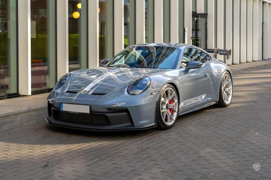 Grey Porsche 911 2024 in Vilnius, with an engine capacity of 4.00 L and mileage of 18 thousand km for 204900 €, photo 1 on AUTOMOTO.COM.LV