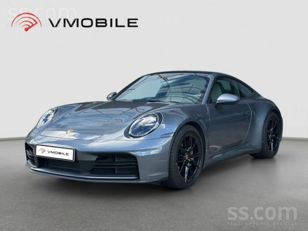 Grey Porsche 911 2025 in Riga, with an engine capacity of 3.00 L and mileage of 13 thousand km for 129900 €, photo 1 on AUTOMOTO.COM.LV