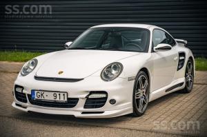 Balts Porsche 911 2007 Rīga, ar dzinēja tilpumu 3.60 L un nobraukumu 55 tūkst. km par 84990 €, foto  vietnē AUTOMOTO.COM.LV