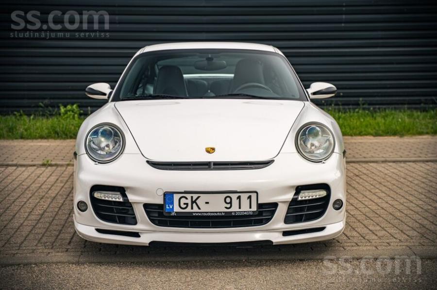 Balts Porsche 911 2007 Rīga, ar dzinēja tilpumu 3.60 L un nobraukumu 55 tūkst. km par 84990 €, foto 3 vietnē AUTOMOTO.COM.LV