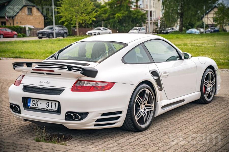 Balts Porsche 911 2007 Rīga, ar dzinēja tilpumu 3.60 L un nobraukumu 55 tūkst. km par 84990 €, foto 5 vietnē AUTOMOTO.COM.LV