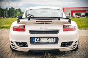 Balts Porsche 911 2007 Rīga, ar dzinēja tilpumu 3.60 L un nobraukumu 55 tūkst. km par 84990 €, foto 6 vietnē AUTOMOTO.COM.LV