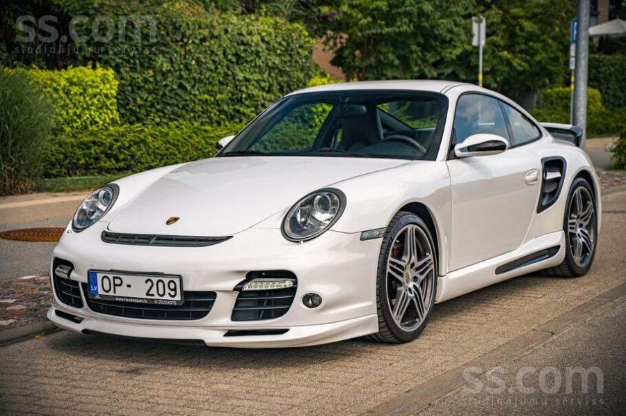 White Porsche 911 2007 in Riga, with an engine capacity of 3.60 L and mileage of 55 thousand km for 74999 €, photo 1 on AUTOMOTO.COM.LV
