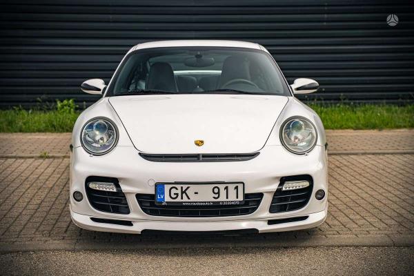 White Porsche 911 2007 in Riga, with an engine capacity of 3.60 L and mileage of 55 thousand km for 79990 €, photo 2 on AUTOMOTO.COM.LV