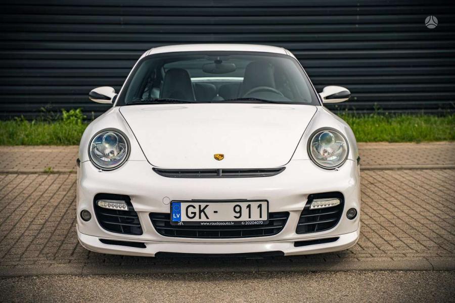 White Porsche 911 2007 in Riga, with an engine capacity of 3.60 L and mileage of 55 thousand km for 79990 €, photo 3 on AUTOMOTO.COM.LV