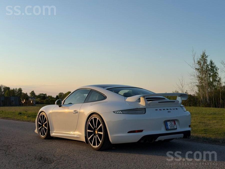 White Porsche 911 2014 in Riga, with an engine capacity of 3.40 L and mileage of 65 thousand km for 84999 €, photo 5 on AUTOMOTO.COM.LV