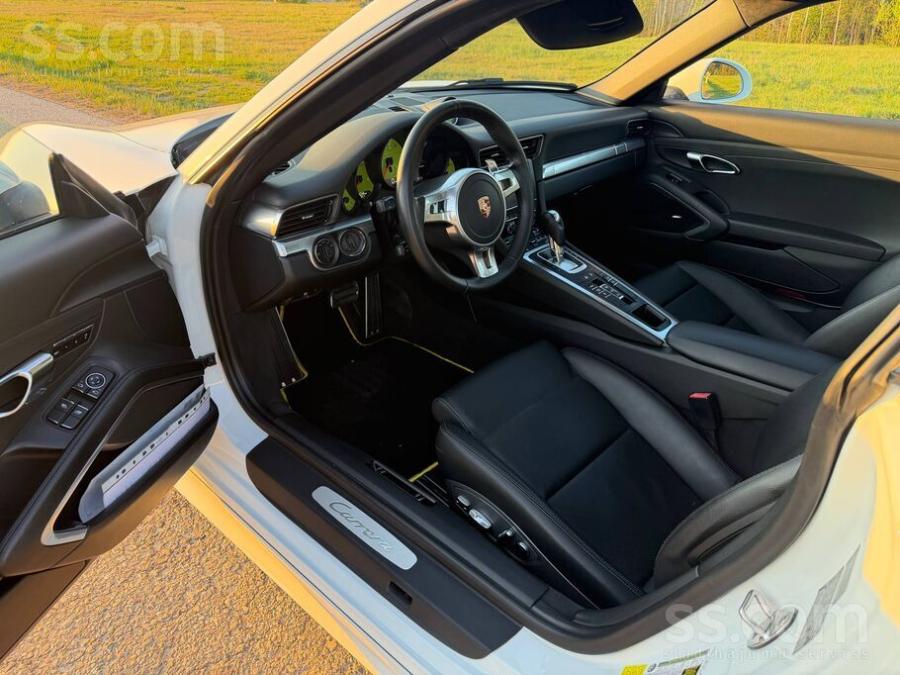 White Porsche 911 2014 in Riga, with an engine capacity of 3.40 L and mileage of 65 thousand km for 84999 €, photo 12 on AUTOMOTO.COM.LV