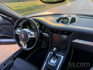 White Porsche 911 2014 in Riga, with an engine capacity of 3.40 L and mileage of 65 thousand km for 84999 €, photo 17 on AUTOMOTO.COM.LV