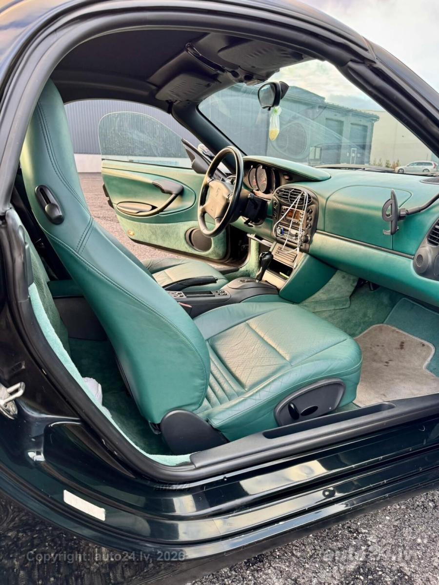 Black Porsche Boxster 1998 in Tallinn, with an engine capacity of 2.50 L and mileage of 136 thousand km for 17000 €, photo 18 on AUTOMOTO.COM.LV