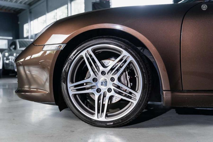 Brūns Porsche Boxster 2009 Viļņa, ar dzinēja tilpumu 2.89 L un nobraukumu 63 tūkst. km par 35000 €, foto 18 vietnē AUTOMOTO.COM.LV