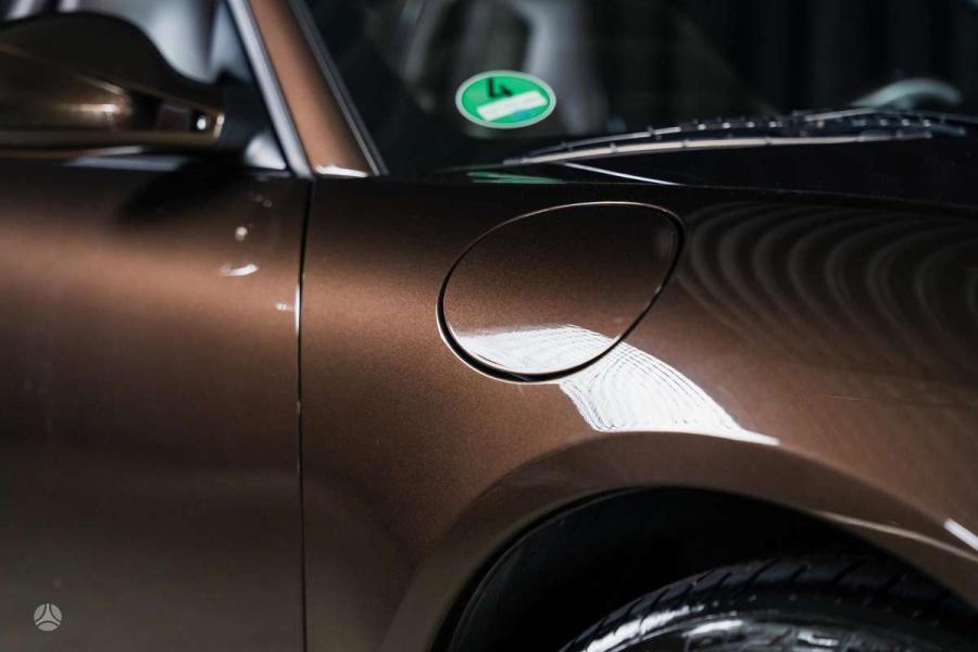 Brūns Porsche Boxster 2009 Viļņa, ar dzinēja tilpumu 2.89 L un nobraukumu 63 tūkst. km par 35000 €, foto 20 vietnē AUTOMOTO.COM.LV