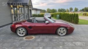 Red Porsche Boxster 1997 in Riga, with an engine capacity of 2.70 L and mileage of 160 thousand km for 15000 €, photo 5 on AUTOMOTO.COM.LV
