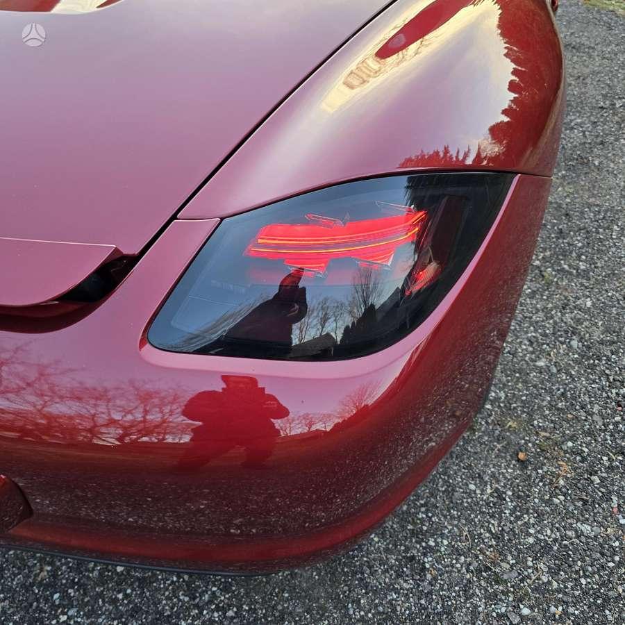 Red Porsche Boxster 2010 in Ukmerge, with an engine capacity of 3.44 L and mileage of 19 thousand km for 29999 €, photo 25 on AUTOMOTO.COM.LV