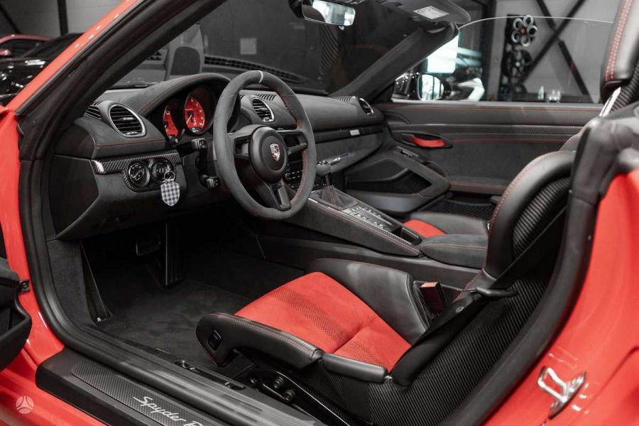 Red Porsche Boxster 2024 in Riga, with an engine capacity of 4.00 L and mileage of 23 thousand km for 145000 €, photo 11 on AUTOMOTO.COM.LV