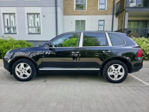 Melns Porsche Cayenne 2005 Rīga, ar dzinēja tilpumu 4.50 L un nobraukumu 216 tūkst. km par 4950 €, foto 28 vietnē AUTOMOTO.COM.LV
