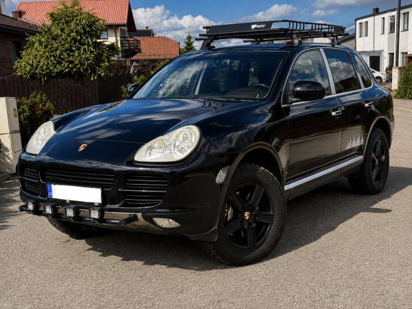 Black Porsche Cayenne 2005 in Klaipeda, with an engine capacity of 4.51 L and mileage of 212 thousand km for 6700 €, photo 3 on AUTOMOTO.COM.LV
