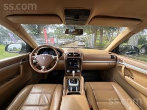 Melns Porsche Cayenne 2006 Rīga, ar dzinēja tilpumu 3.20 L un nobraukumu 310 tūkst. km par 4290 €, foto 20 vietnē AUTOMOTO.COM.LV