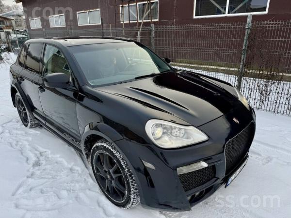Black Porsche Cayenne 2009 in Riga, with an engine capacity of 3.00 L and mileage of 185 thousand km for 11500 €, photo 1 on AUTOMOTO.COM.LV