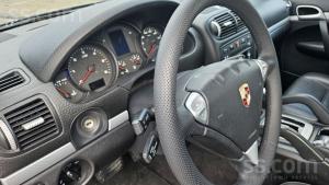 Black Porsche Cayenne 2009 in Riga, with an engine capacity of 3.00 L and mileage of 257 thousand km for 10650 €, photo 8 on AUTOMOTO.COM.LV