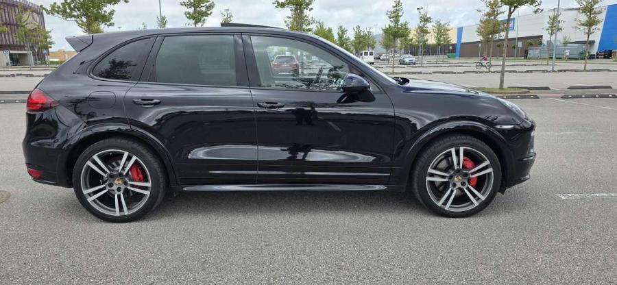 Black Porsche Cayenne 2013 in Klaipeda, with an engine capacity of 4.80 L and mileage of 209 thousand km for 16800 €, photo 3 on AUTOMOTO.COM.LV