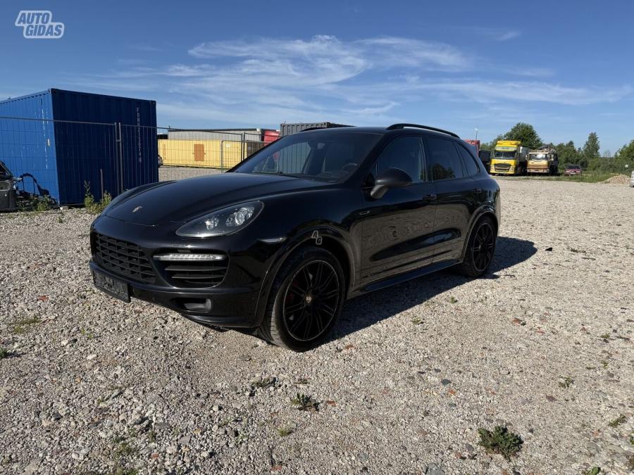 Black Porsche Cayenne 2013 in Vilnius, with an engine capacity of 4.80 L and mileage of 480 thousand km for 7200 €, photo 1 on AUTOMOTO.COM.LV