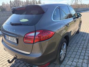 Brown Porsche Cayenne 2011 in Riga, with an engine capacity of 3.00 L and mileage of 247 thousand km for 13000 €, photo 4 on AUTOMOTO.COM.LV