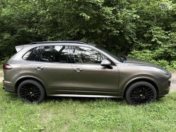 Brown Porsche Cayenne 2014 in Kaunas, with an engine capacity of 3.00 L and mileage of 240 thousand km for 22000 €, photo 7 on AUTOMOTO.COM.LV
