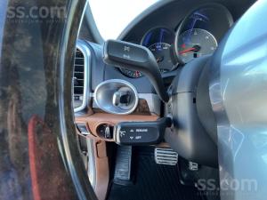 Brown Porsche Cayenne 2016 in Riga, with an engine capacity of 4.20 L and mileage of 202 thousand km for 26990 €, photo 26 on AUTOMOTO.COM.LV