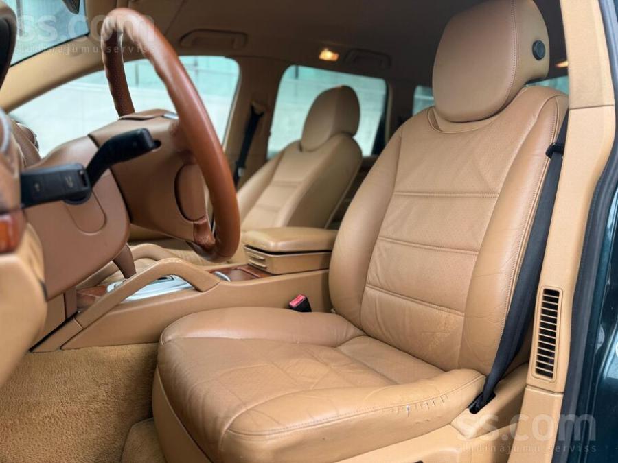Green Porsche Cayenne 2004 in Riga, with an engine capacity of 3.20 L and mileage of 0 thousand km for 5600 €, photo 9 on AUTOMOTO.COM.LV