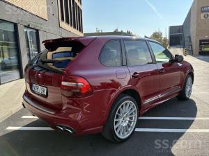 Red Porsche Cayenne 2008 in Riga, with an engine capacity of 4.80 L and mileage of 245 thousand km for 19900 €, photo 3 on AUTOMOTO.COM.LV